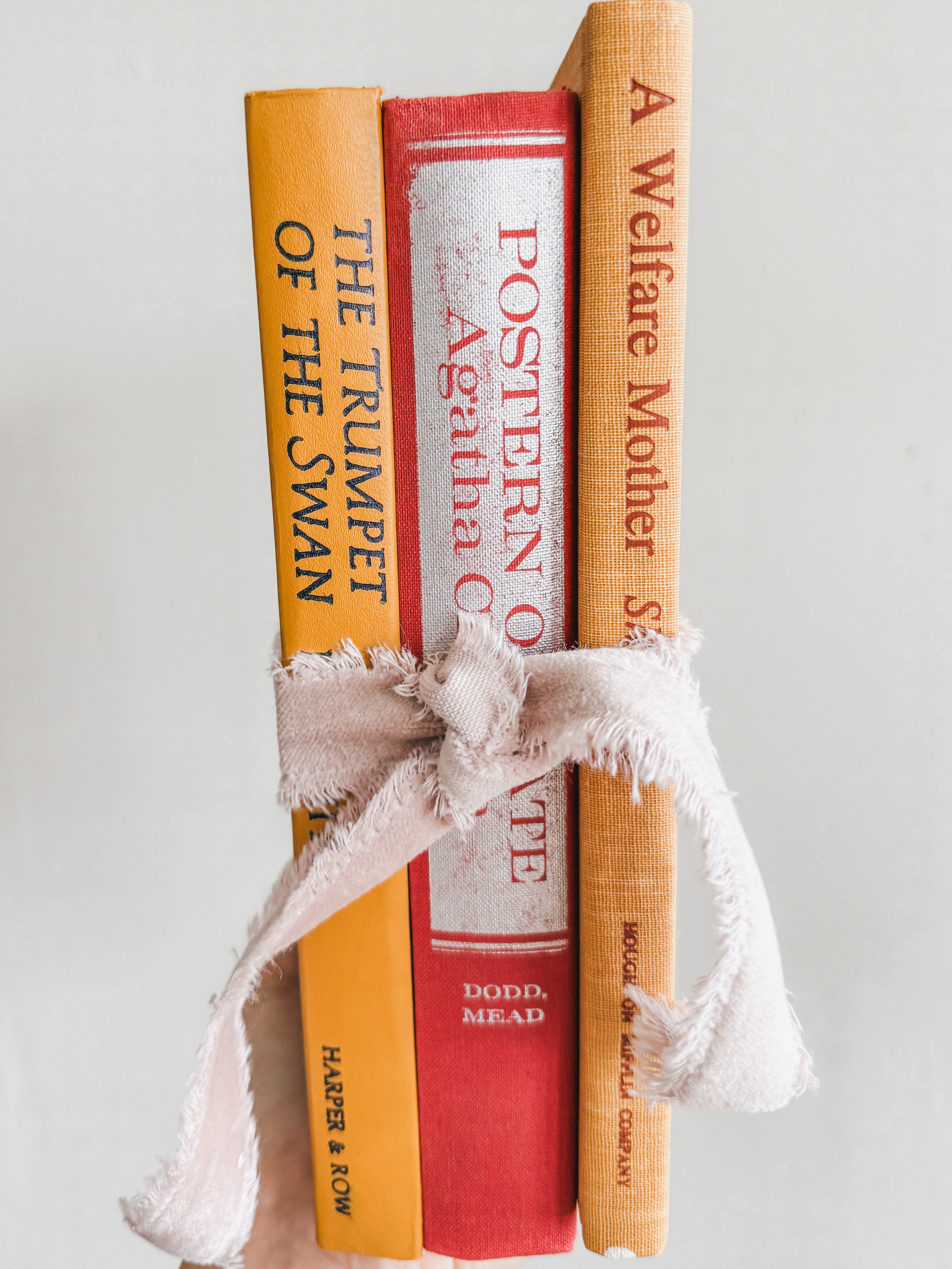 Autumn colored book stack – Finches & Ferns